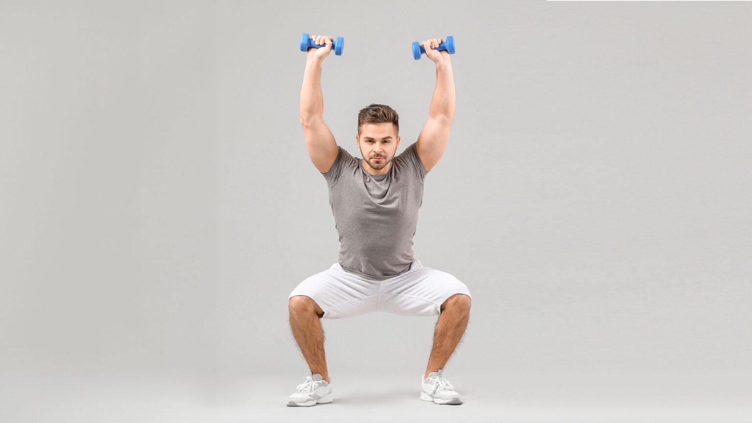 Dumbbell Squat Press for Sculpted Quads and Shoulders – Merlin Health